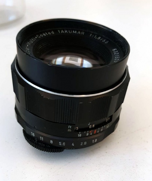 Lente TAKUMAR Super Multi Coated, 1:1.8/55, fabricada p